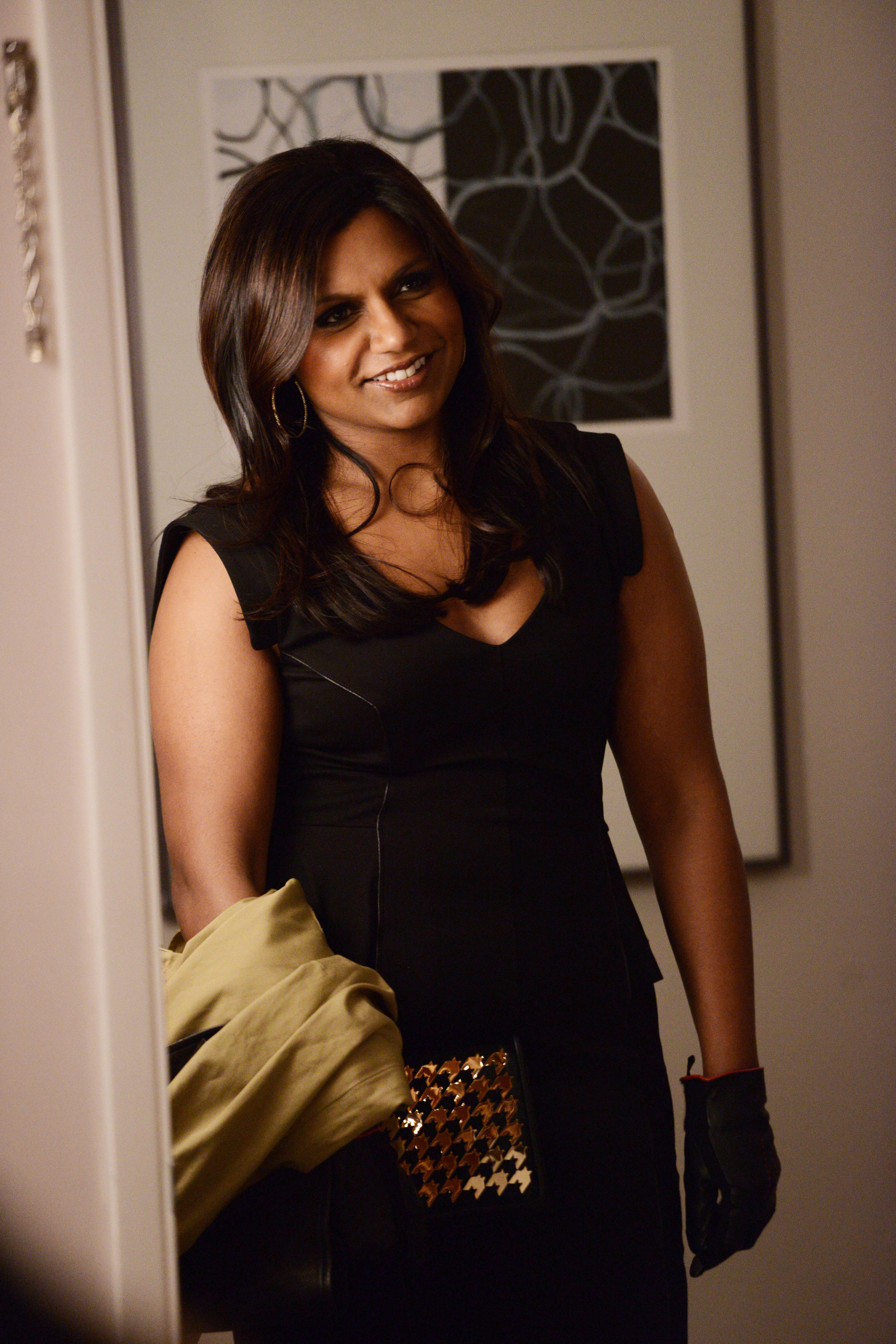 WornOnTV: Mindy’s black peplum dress and gold houndstooth clutch on The ...